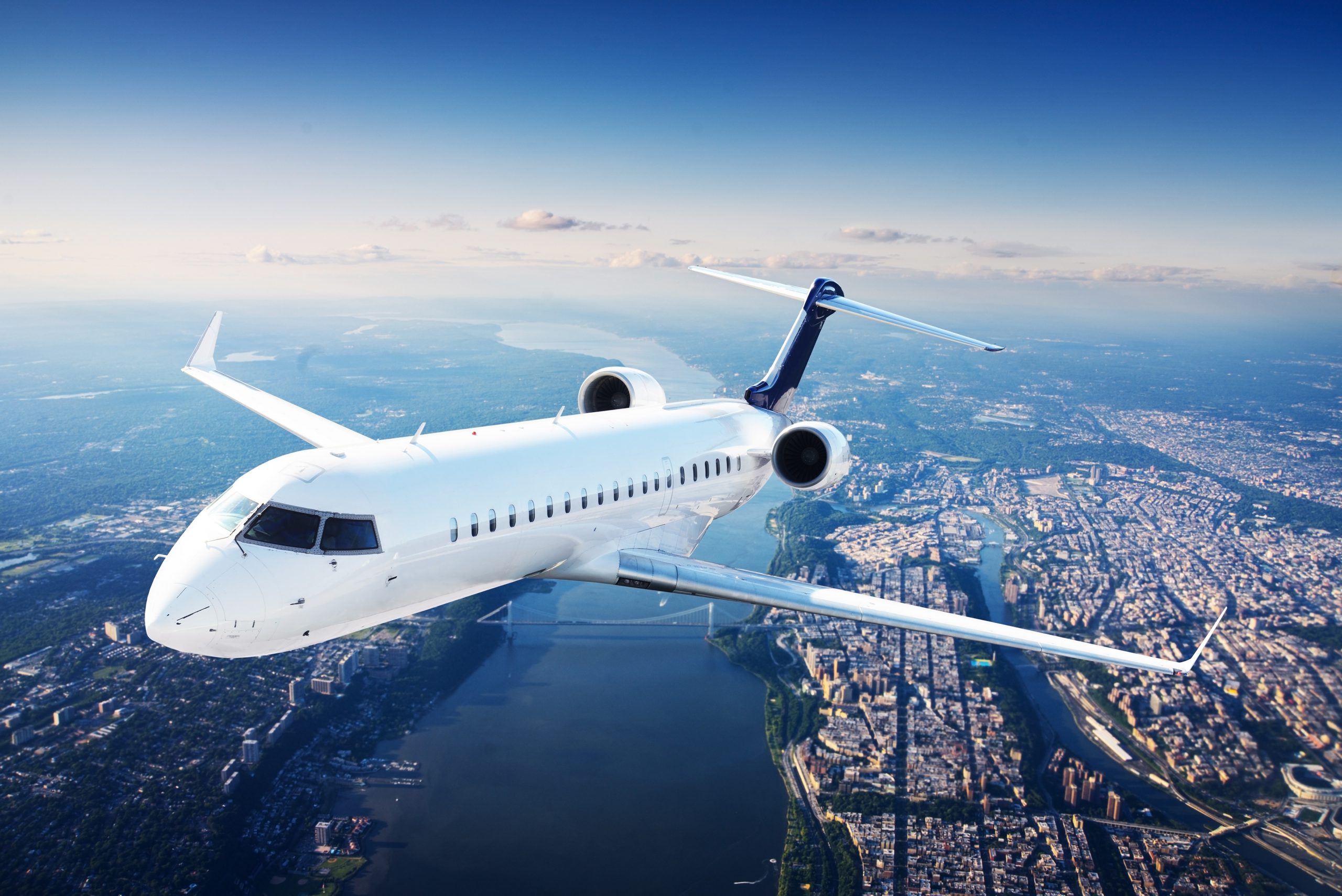 Private jet plane in the blue sky | NSS